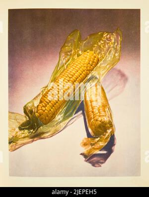 Vintage USSR. An old plastic yellow alarm clock against a gray ...