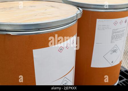 Wooden barrel with dangerous chemicals and symbols Stock Photo - Alamy