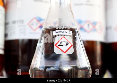 Acetic acid in glass, chemical in the laboratory and industry Stock ...