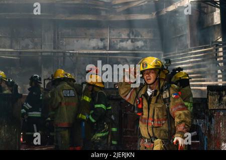Pasig, Philippines. 28th June, 2022. A fire volunteer seen inside the ...