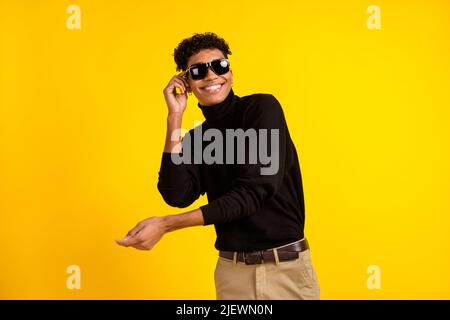 Photo of pretty funky dark skin guy dressed checkered shirt showing v ...
