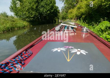 canal boat front rear looking forward down canal Stock Photo - Alamy