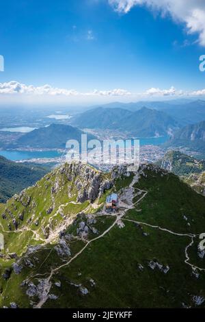 Aerial view of the top of Monte Resegone and Rifugio Azzoni in winter ...