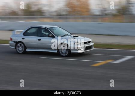 Modern AWD japan sports car in the track. Subaru Impreza Stock Photo ...