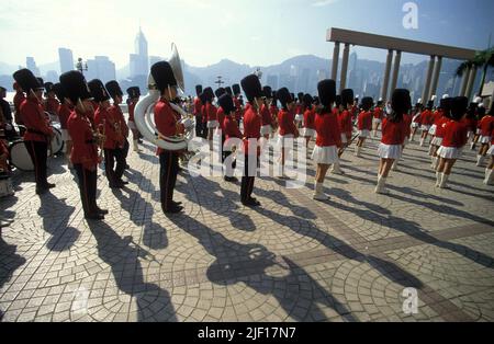 traditional British Uniforms at a show on the waterfront of Kowloon in front of the skyline of ...