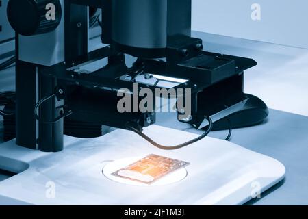 Chip testing equipment. Manufacturing of microchips. A close-up study ...