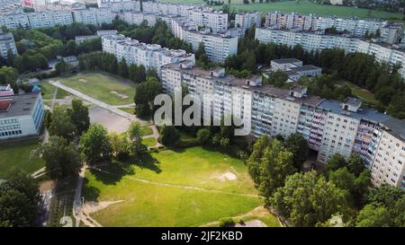Tranquil suburbs in a big city. Multi-storey buildings and a large ...