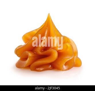 Soft melted caramel isolated on a white background. Flowing toffee ...