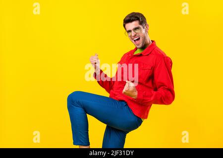 Photo of hooray young brunet guy show telephone yell wear spectacles ...