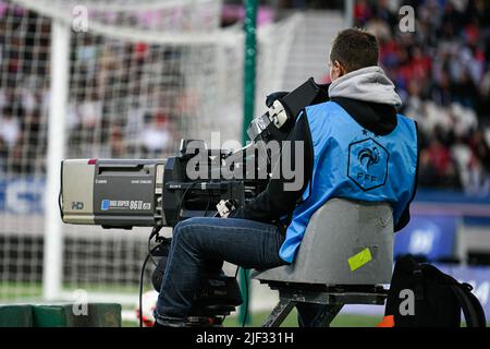 Illustration picture shows a man (cameraman, camera operator) filming ...