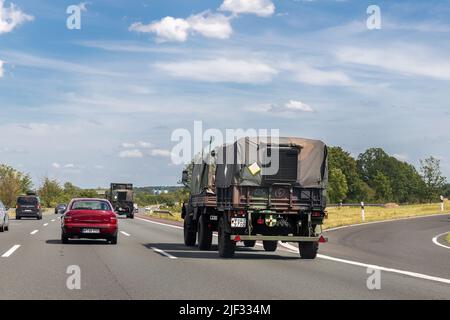 German armoured semi-trailer cargo truck carrier drives military convoy ...
