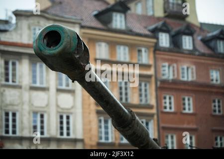 Visitors look at Russian tanks on display near the Royal Castle in ...