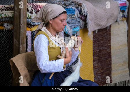 Siggiewi, Malta. 29th June, 2022. A man weaves during the traditional ...