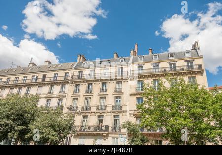 Typical facade of Parisian Haussmann buildings: detail of the balcony ...