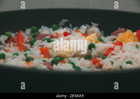 Rice three delights, ready to eat Stock Photo - Alamy