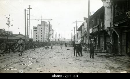 Shanghai after air raid during the Japanese invasion of Shanghai in ...
