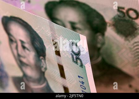 Chinese money - 50 Yuan - business background Stock Photo - Alamy