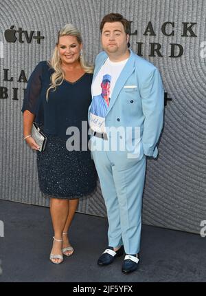 Paul Walter Hauser and Amy Boland arriving to Apple's "Black Bird ...