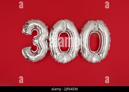 Silver balloon showing number 300 three hundred pink background Stock ...