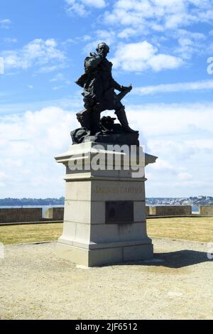 Statue of Jacques Cartier on the ramparts of the walled city of Saint ...