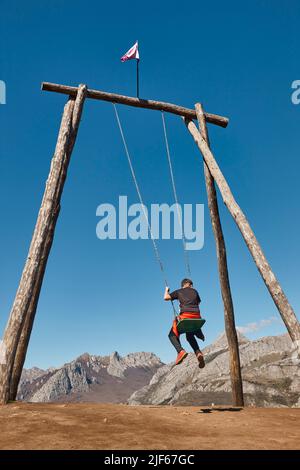 Huge swing surrounded by mountains in Riano village. Spain Stock Photo ...