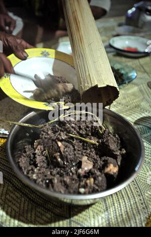 Traditional food called pa'piong (papiong), which is spiced chicken ...
