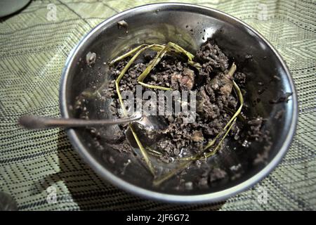 Traditional food called pa'piong (papiong), which is spiced chicken ...
