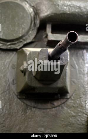 Tank gun, barrel muzzle of a military army close-up. Broken burnt tank ...
