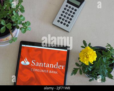 In this photo illustration, Grupo Santander logo seen displayed on a ...