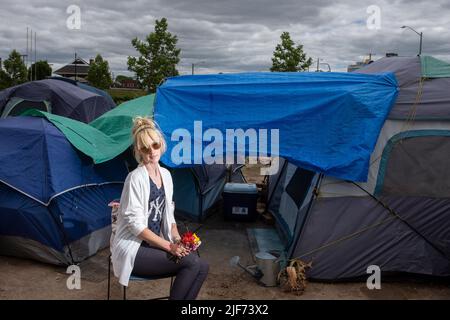 Britney O'Donnell is photographed outside her home in a large homeless ...