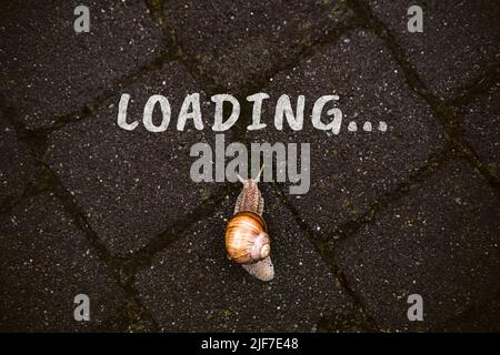 Loading, downloading, slow internet speed concept Stock Photo - Alamy