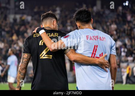 FC Dallas defender Marco Farfan (4) and Colorado Rapids midfielder Cole ...