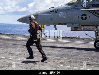 US Navy A plane captain assigned to the Diamondbacks of Strike Fighter ...