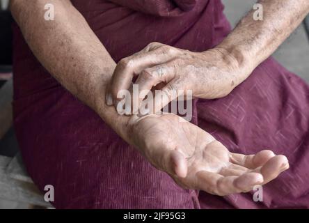 Self-examination of pulsation. Counting pulse rate in home Stock Photo ...