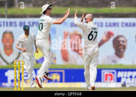 Pat Cummins and Nathan Lyon of Australia are seen during an Australia ...