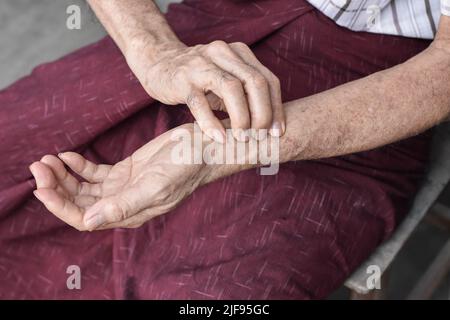 Self-examination of pulsation. Counting pulse rate in home Stock Photo ...