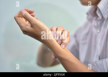 Self-examination of pulsation. Counting pulse rate in home Stock Photo ...