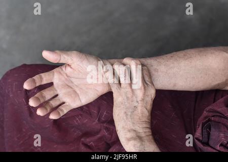 Self-examination of pulsation. Counting pulse rate in home Stock Photo ...