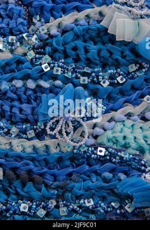 Complex embroidery background. Patchwork. Handmade background. Beads ...