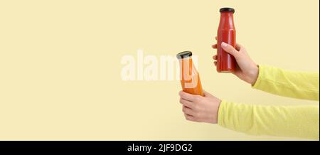 Female hands with different healthy smoothies on color background Stock ...