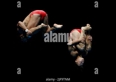 Anton Knoll and Dariush Lotfi of Austria compete in the men's 10m ...