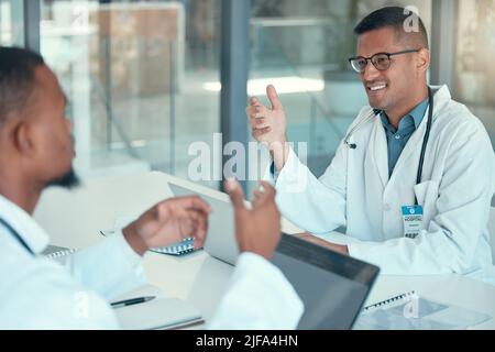 Two doctors colleagues working in hospital Stock Photo - Alamy