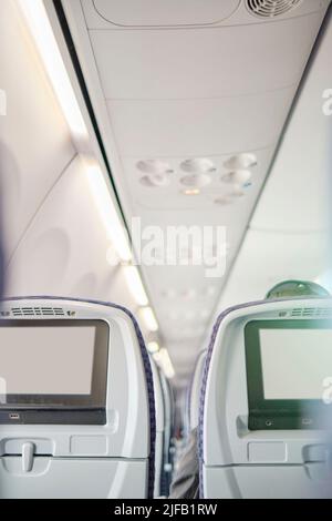 Crop image of airplane screen device for entertainment to serve ...