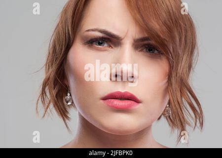 Suspicious look. Distrust in partner Stock Photo - Alamy