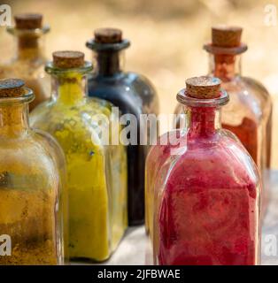 medieval historical reenactment - glass bottles with cork stopper with ...