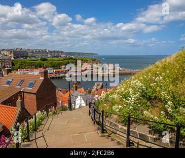 Looking east over historic Whitby keyside, wharf, beside the river Esk ...