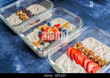 Three oatmeal breakfast combinations with different toppings Stock ...