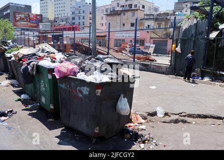 Trash scattered in a street of Beirut June 29 2022. (Photo by Elisa ...