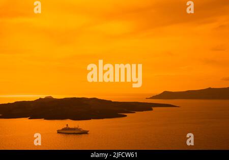 Nea Kameni island across from Santorini and luxury cruise ship ...
