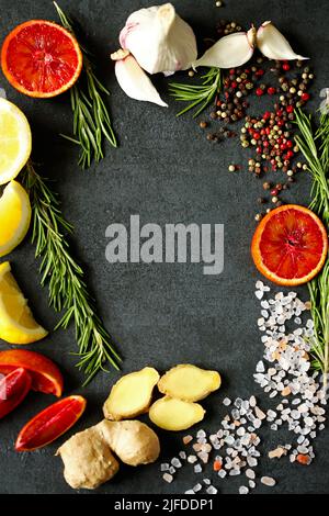 . Set spice on a black stone board. Peppers mix, Himalayan salt ...